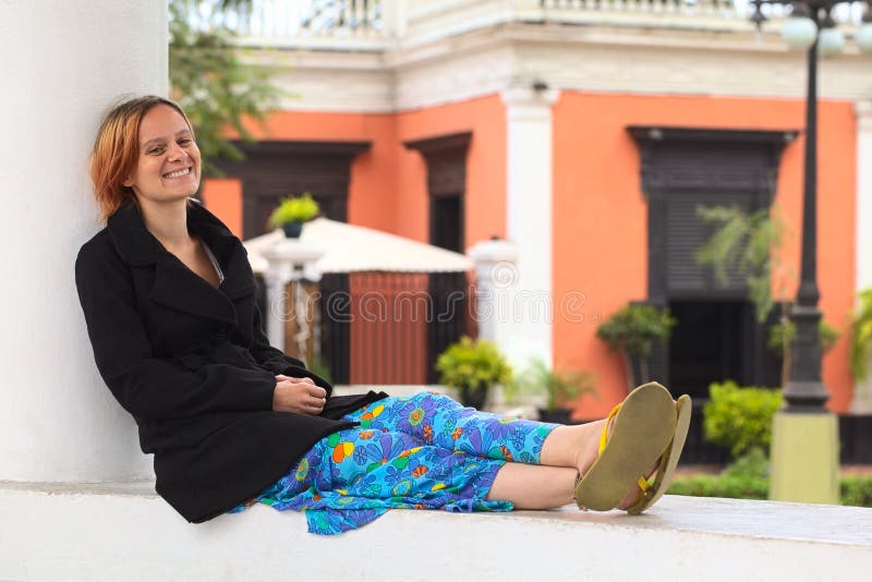 Young Woman Sitting at a Column Stock Image - Image of short, joyful ...