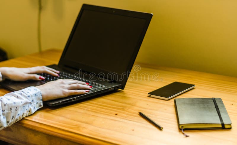 Young Woman Sitting at the Computer and Typing Stock Photo - Image of ...