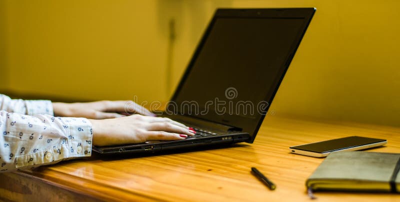 Young Woman Sitting at the Computer and Typing Stock Photo - Image of ...