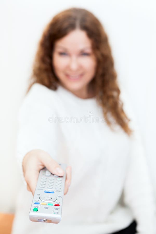 Young Woman Sitting with Ctretched Hands with Tv Remote Stock Image ...