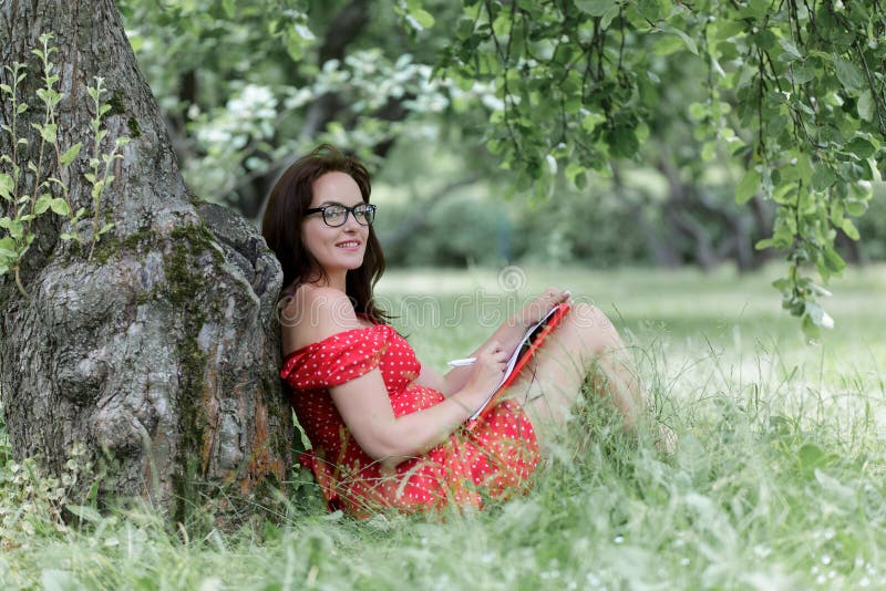 136 Woman Writing Under Tree Stock Photos - Free & Royalty-Free Stock ...