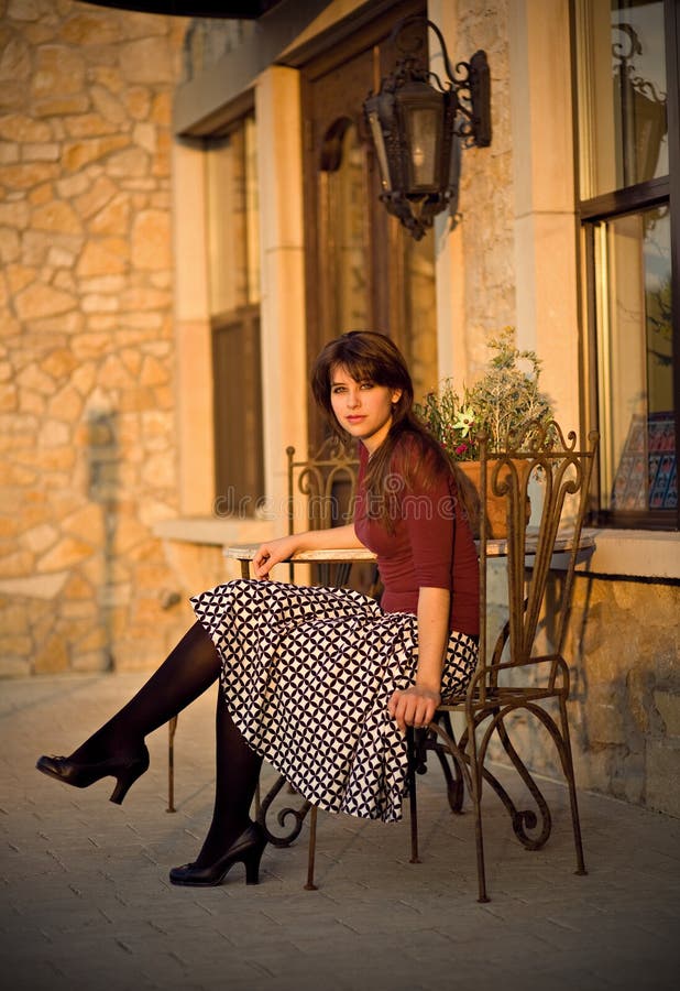 Young Woman Sitting Outside Stock Image - Image of outside, person ...