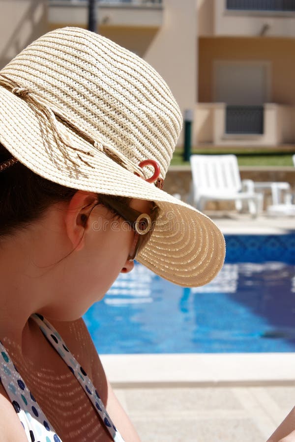 Young Woman Sitting at the Pool Side Stock Photo - Image of outdoors ...