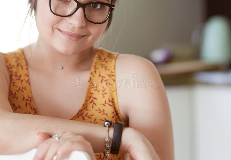 Young Woman Sitting a Table in the Kitchen Stock Image - Image of ...