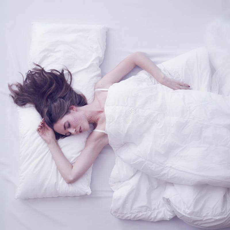 Young Woman Sleeping in Bed Stock Photo - Image of female, enjoy: 157424724