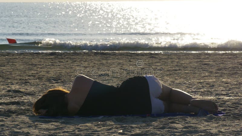 Young Woman Sleeping on the Sandy Beach Stock Video - Video of seagull ...