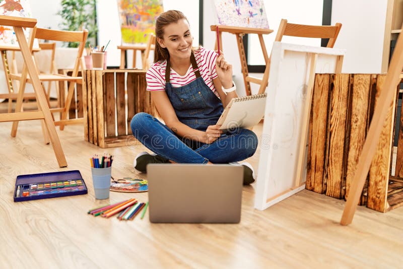 Young Woman Smiling Confident Having Online Draw Class at Art Studio ...