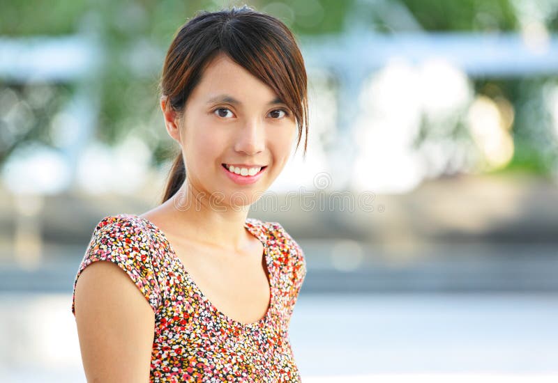 Young Woman Smiling Friendly Stock Photo - Image of people, cute: 20277746