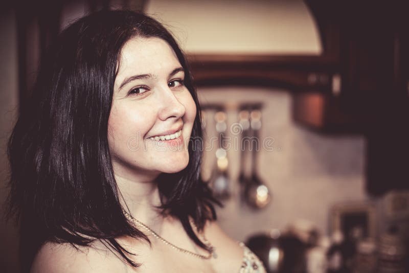 Young Woman Smiling in the Kitchen Portrait Stock Photo - Image of ...
