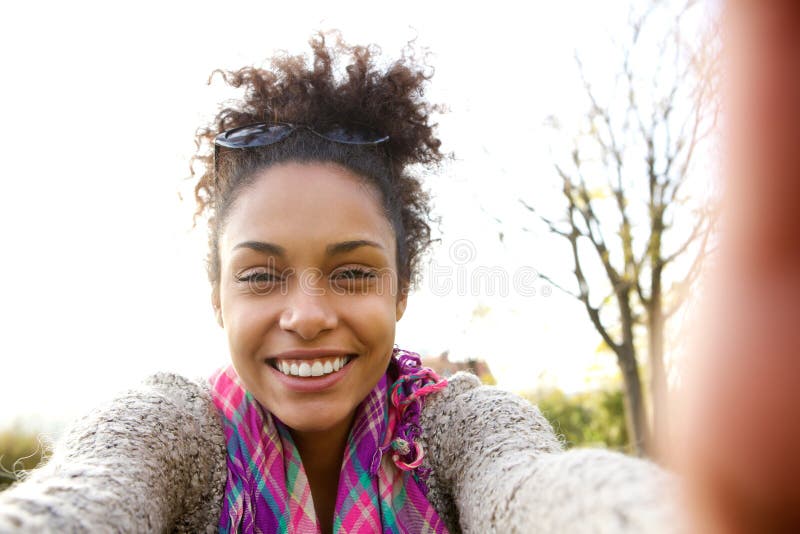 Young Woman Smiling and Talking a Selfie Stock Photo - Image of girl ...