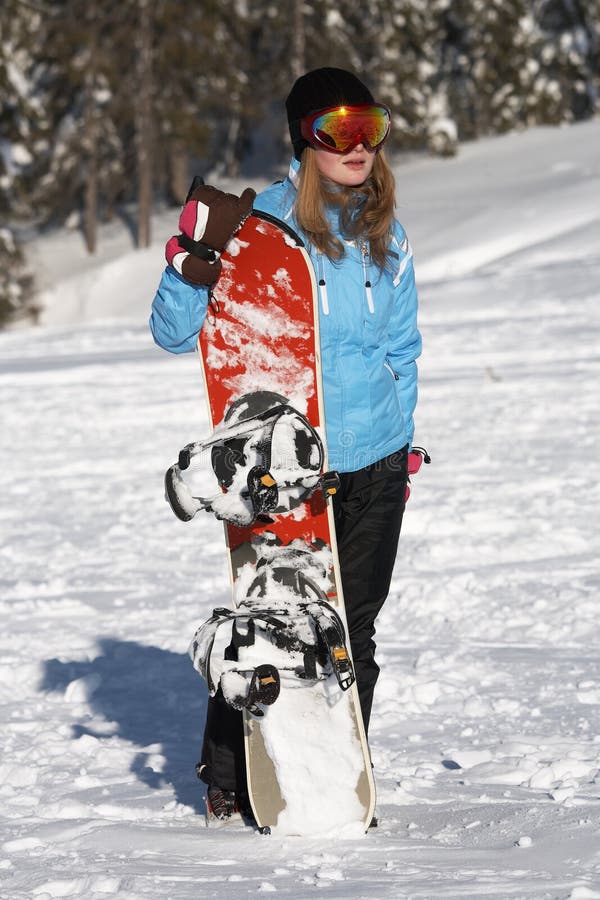Young woman snowboarder stock photo. Image of sport - 177275106