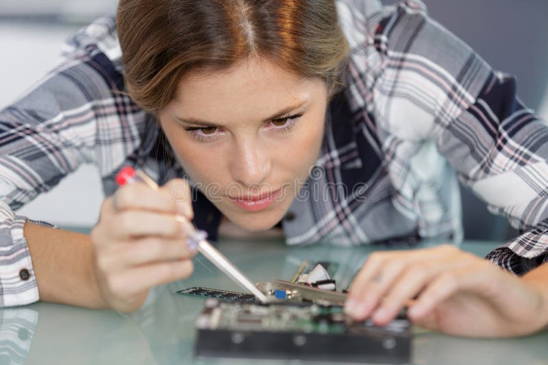 A Woman is Soldering in the Transparent Dome of the Glamping Hotel ...