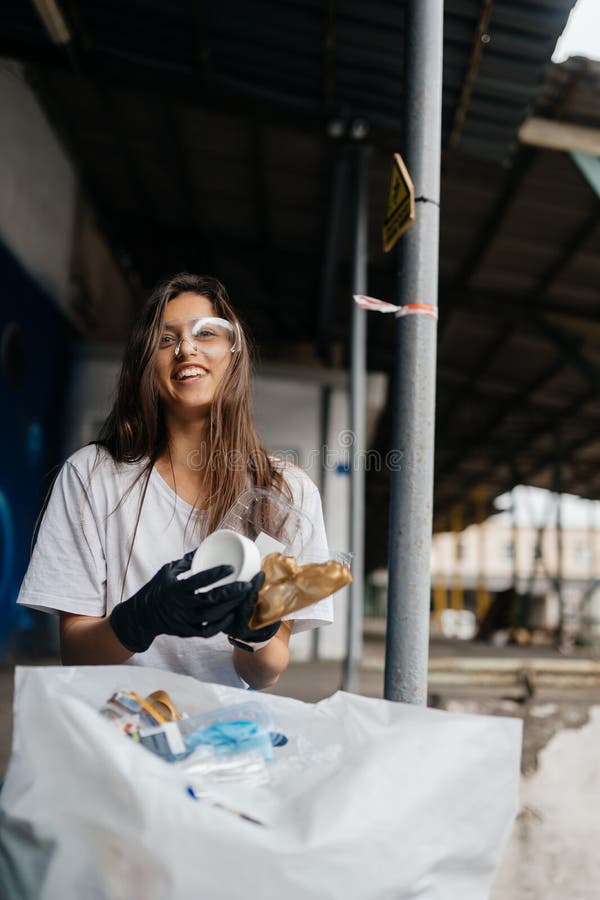 Young Woman Sorting Garbage. Concept of Recycling. Zero Waste Stock ...