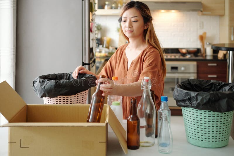 Young Woman Sorting Garbage Stock Image - Image of recycling, bottle ...