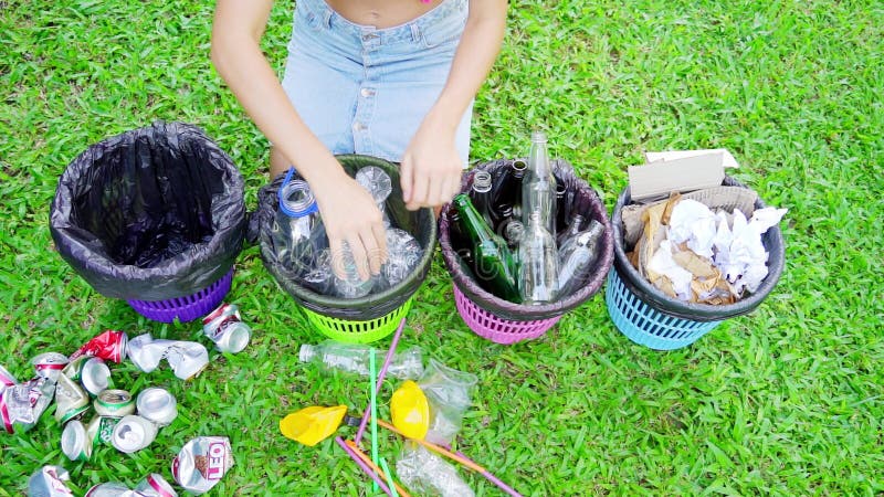 Young Woman Sorting Garbage in the Yard of the House Stock Video ...