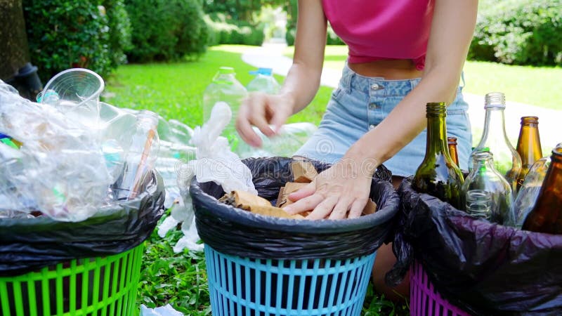 Young Woman Sorting Papper Trash in the Yard of the House Stock Video ...