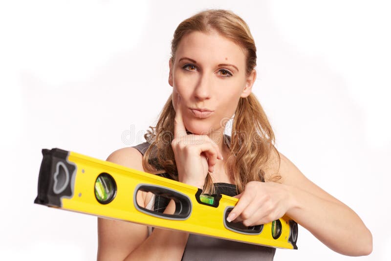 Young Woman with a Spirit Level Stock Image - Image of straight ...