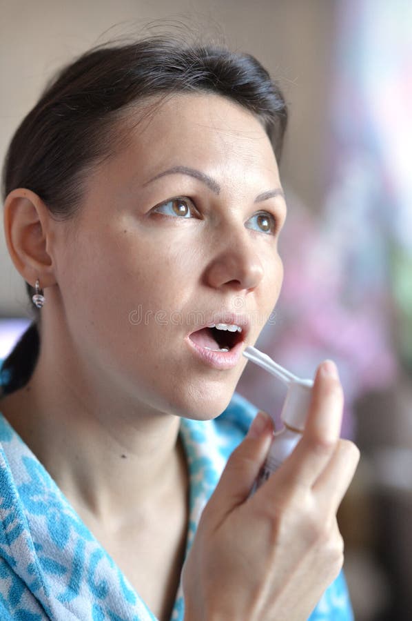 Young Woman with Inhaler in Hand Stock Image - Image of caucasian ...
