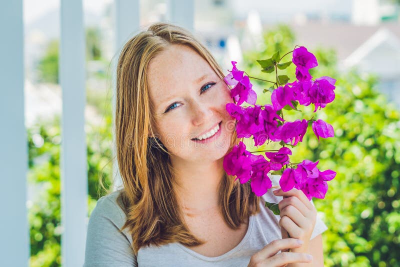 Young Woman with Spring Purple Flowers. Spring Concept Stock Photo ...