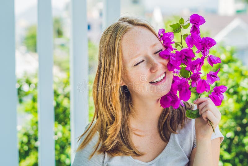 Young Woman with Spring Purple Flowers. Spring Concept Stock Photo ...