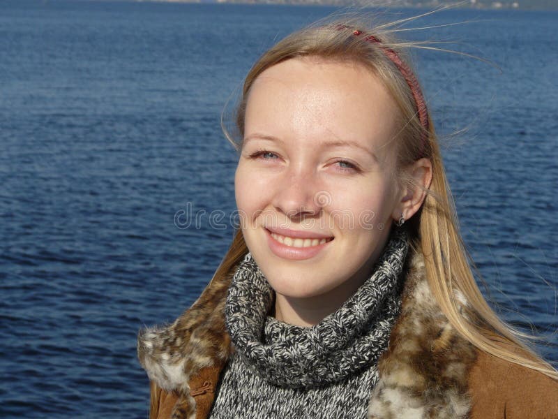 Young woman squinting stock image. Image of smile, blond - 10802223