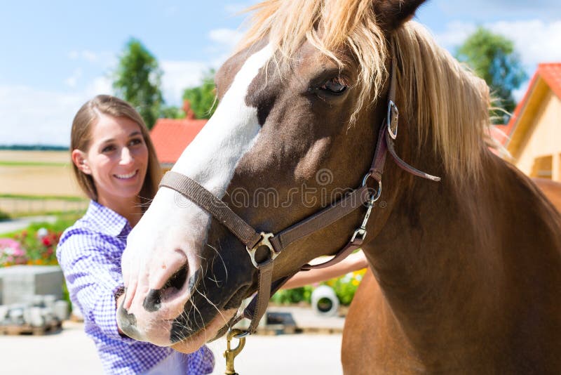 Young Woman in the Stable with Horse and is Happy Stock Image - Image ...