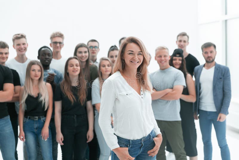Young Woman Standing in Front of a Group of Diverse Young People Stock ...