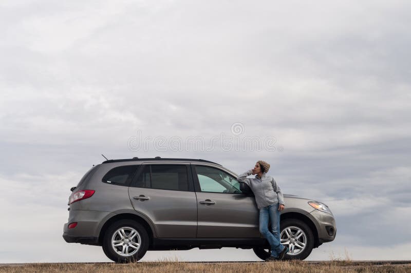 Young Woman Standing Leaning on the Car Stock Photo - Image of front ...