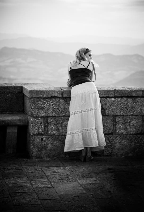 Young Woman Standing at the Railing Stock Image - Image of young ...