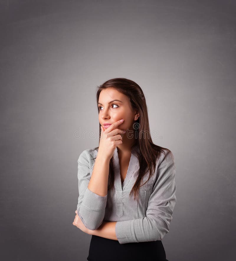 Young Woman Standing and Thinking with Copy Space Stock Photo - Image ...