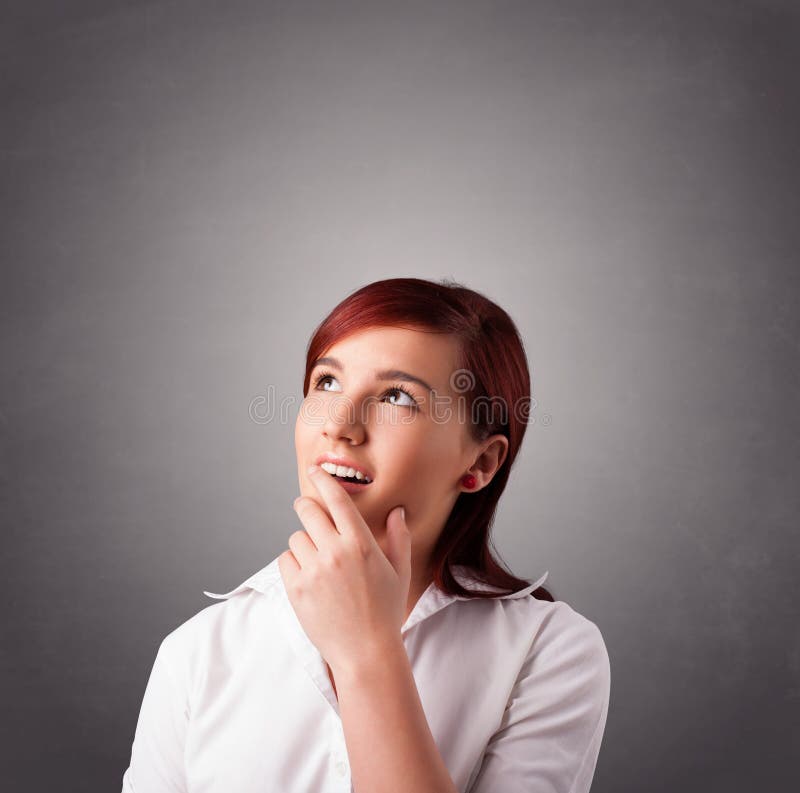 Young Woman Standing and Thinking with Copy Space Stock Photo - Image ...