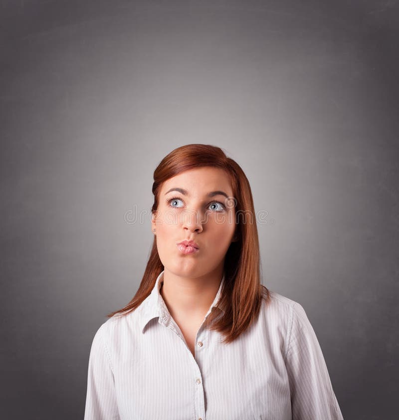 Young Woman Standing and Thinking with Copy Space Stock Photo - Image ...