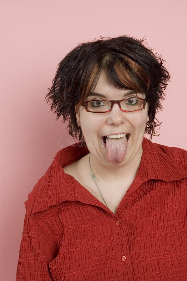Young Woman Sticking Out Tongue Stock Photo - Image of people, blouse ... Young Woman Sticking Out Tongue Stock Photo - Image of people, blouse ...
