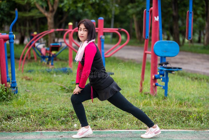 Young Woman Stretching Muscle Stock Photo - Image of happy, adult ...