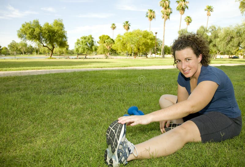 Young Woman Stretching Before Working Out Stock Image - Image of active ...