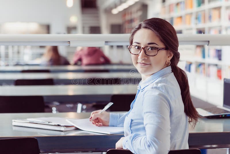 Young Woman Student Learning in the Library Stock Image - Image of ...