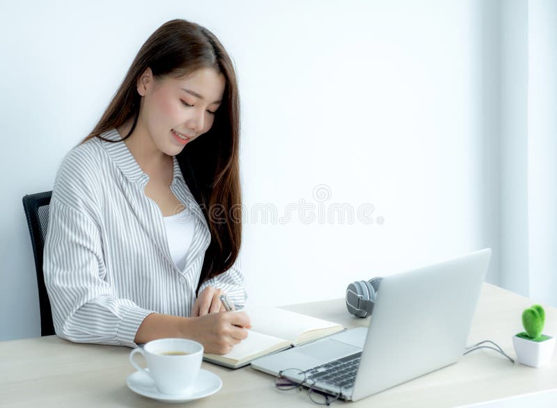 Young Woman Student Taking Notes Watching Laptop Study Online Class ...