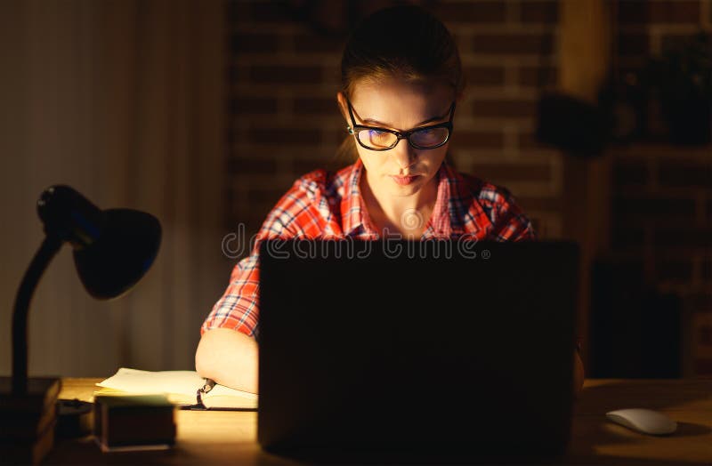 Young Woman Student Working on the Computer at Night Stock Photo ...