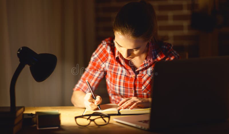 Young Woman Student Working on the Computer at Night Stock Image ...