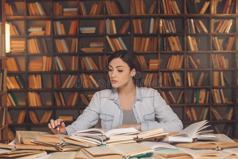 Young Woman Study in the Library Alone Stock Photo - Image of holding ...