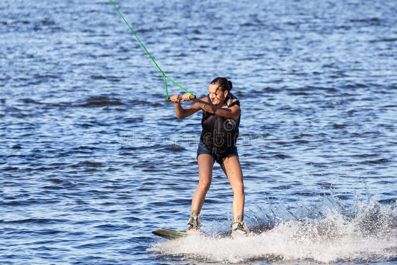 Young Woman Study Riding Wakeboarding on a Lake Stock Photo - Image of ...