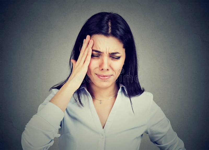 Young Woman Suffering from Headache Touching Her Head with Hand Stock ...