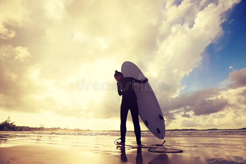 Woman surfer wit surfboard stock photo. Image of solo - 95060242