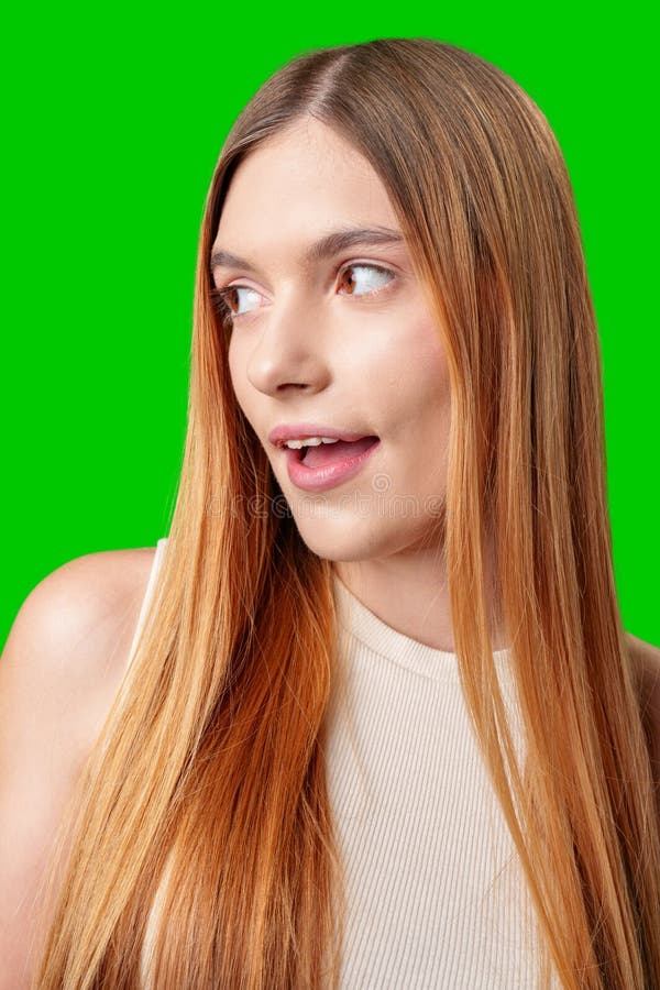 Woman Making Peace Sign Gesture in Front of Green Screen Stock Photo ...