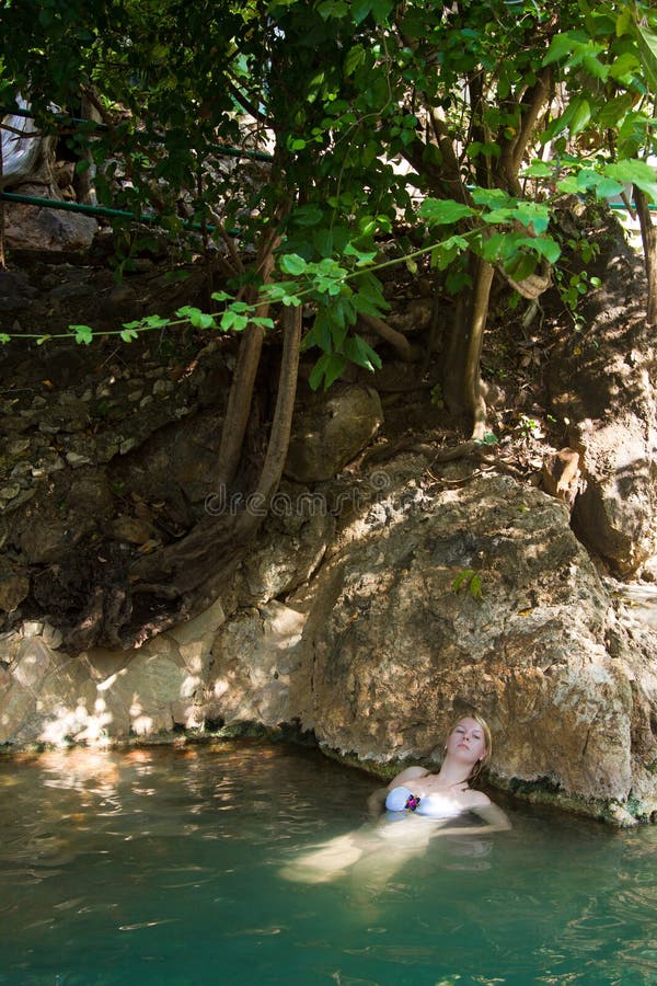 Young Woman Swimming in River Stock Photo - Image of bathe, wild: 140305286