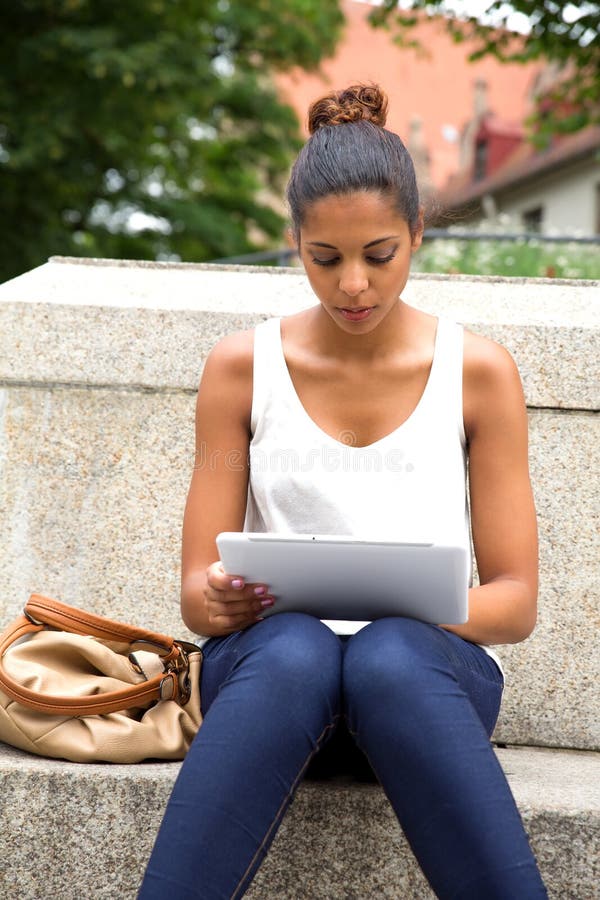 Young woman with tablet stock image. Image of face, ethnic - 59981745
