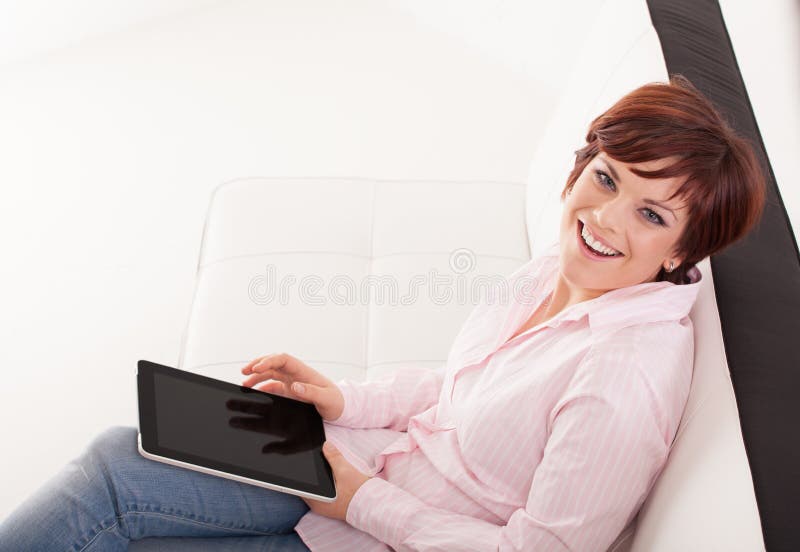 Young woman with tablet stock photo. Image of information - 30748816