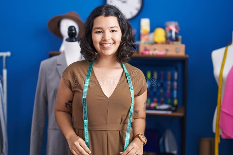 Young Woman Tailor Smiling Confident Standing at Sewing Studio Stock ...