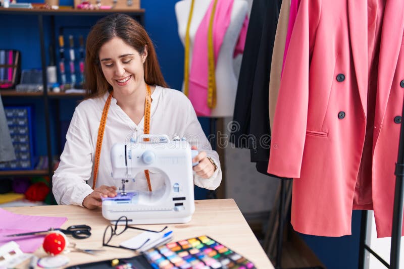 Young Woman Tailor Smiling Confident Using Sewing Machine at Sewing ...