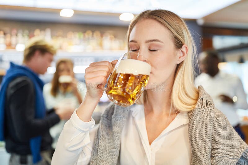 Young Woman Takes a Big Sip of Beer Stock Image - Image of party, time ...